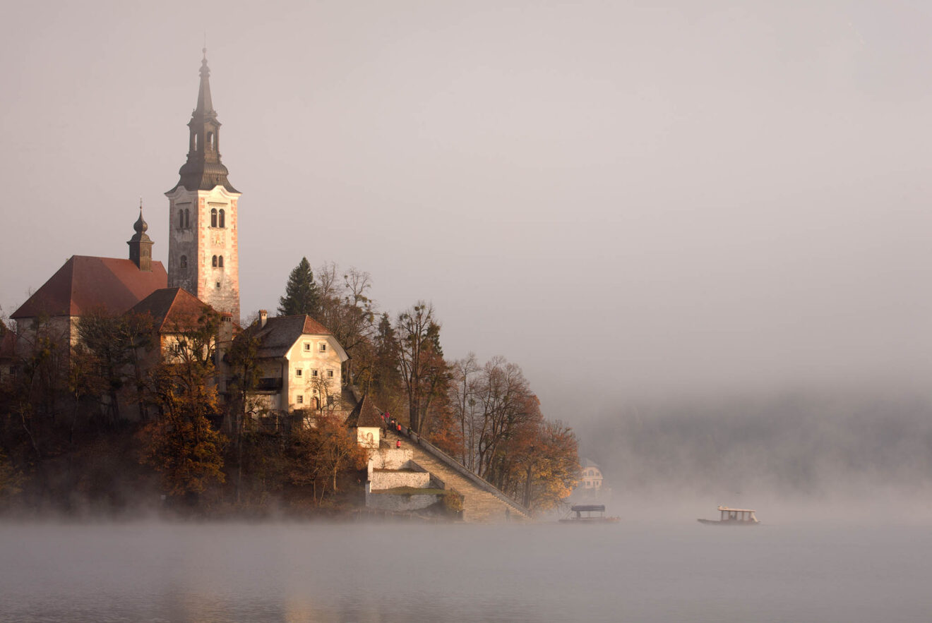 The famous Island church enshrouded in mist over Lake Bled - Buy fine ...